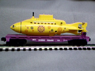 Lionel 0 FLATCAR WITH PSYCHEDELIC SUBMARINE.